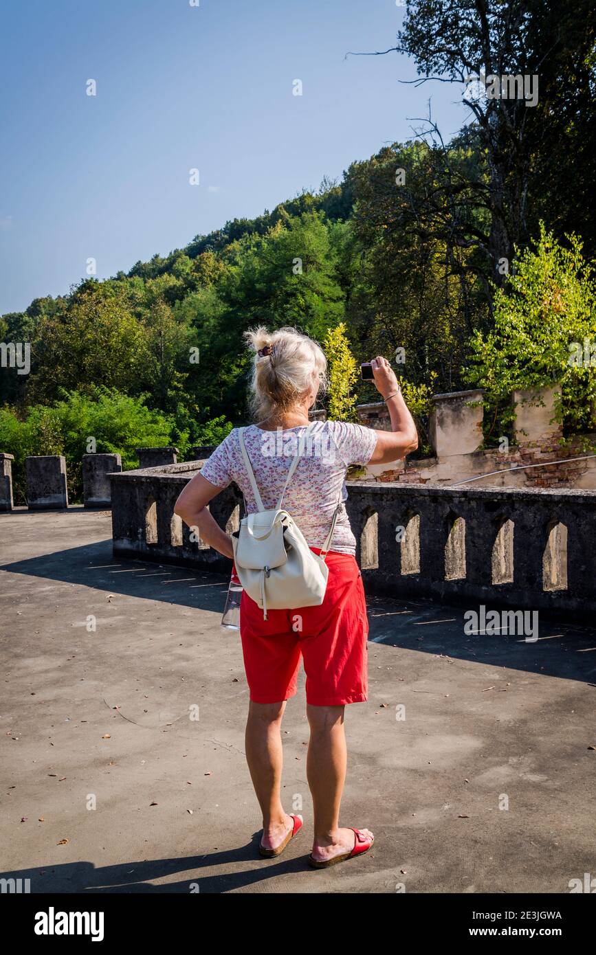 Woman taking a photograph, Castle Bosiljevo, medieval castle owned by ...