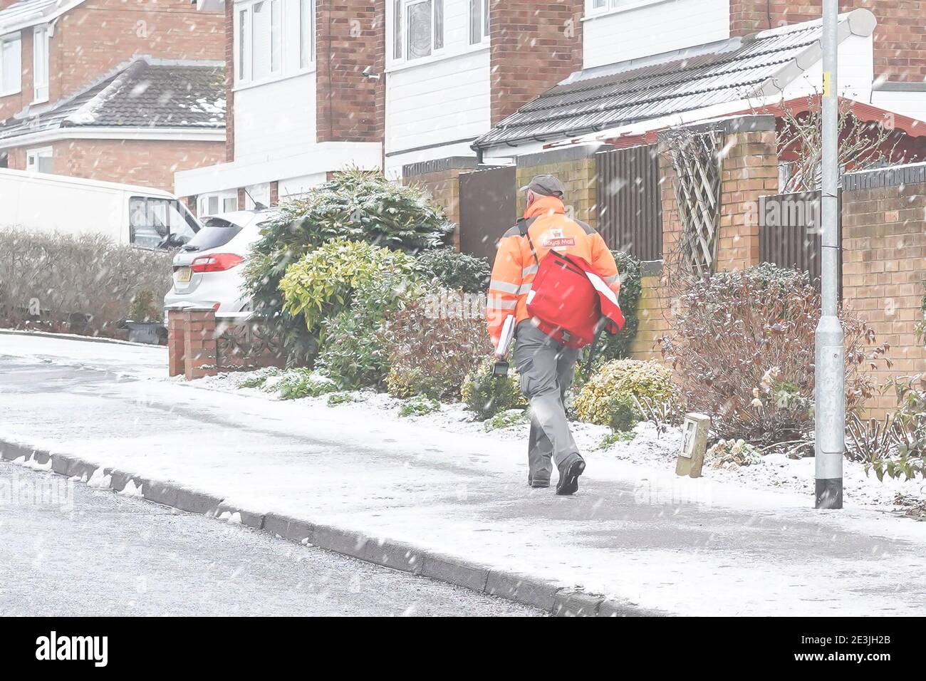 Postman delivering snow hi-res stock photography and images - Alamy