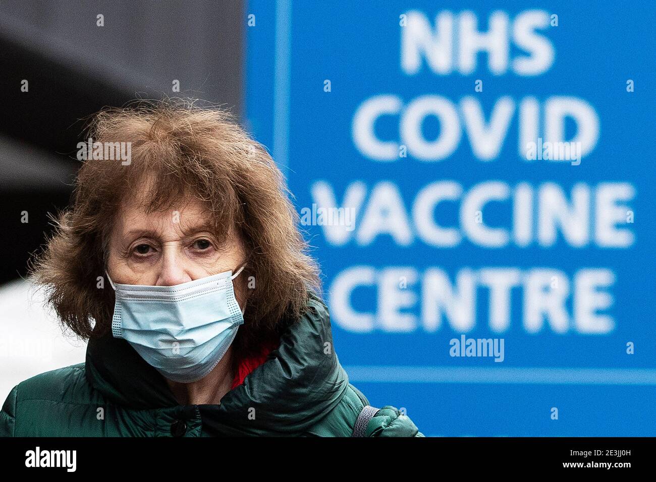 People wearing masks leave the NHS Covid vaccine centre on the 19th of ...