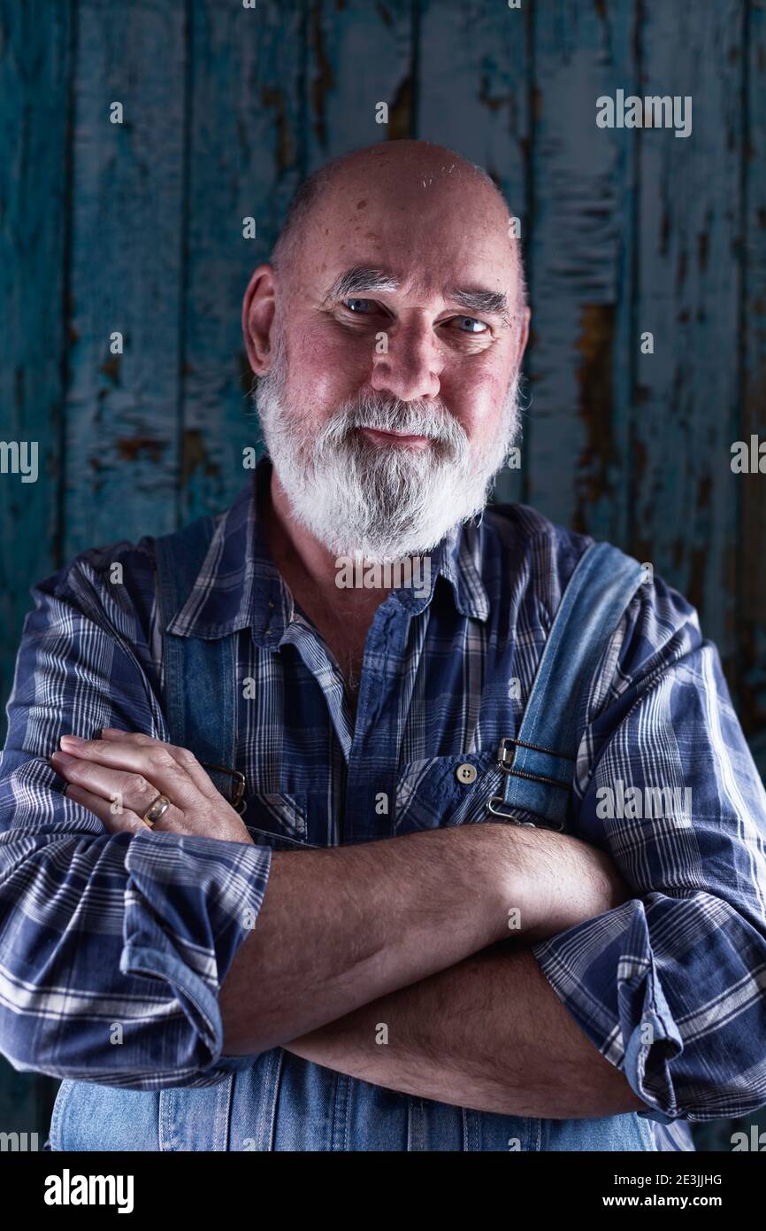 Man in bib overalls hi-res stock photography and images - Alamy