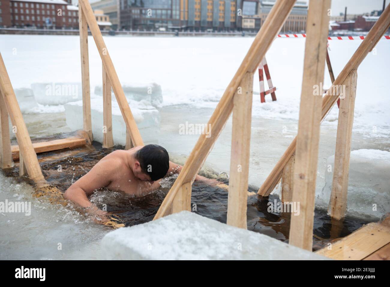 Ice hole swimming man hi-res stock photography and images - Alamy
