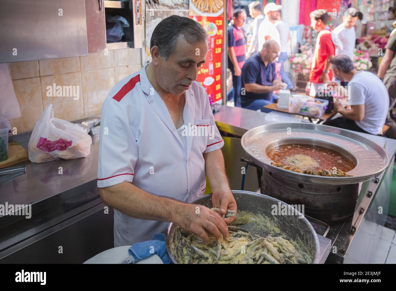 Istanbul, Turkey - September 19 2017: A Turkish street vendor prepares ...