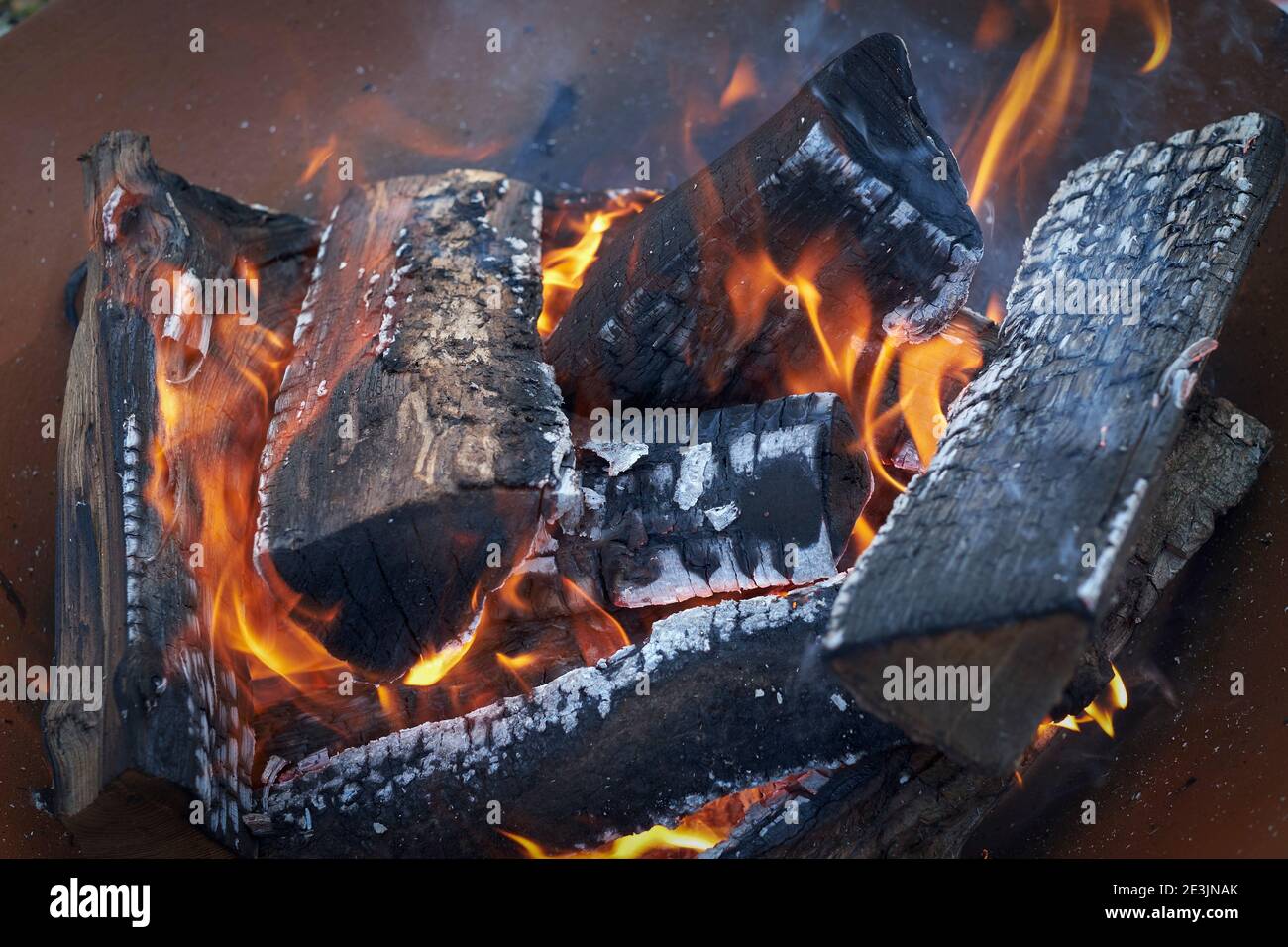 close up of a bonfire with already charred wood and flames Stock Photo ...