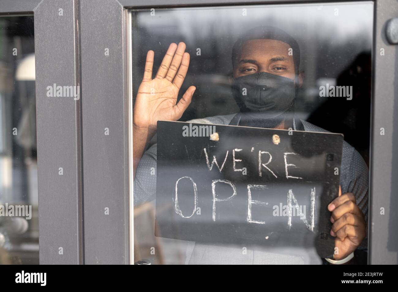 African american waiter in mask hi-res stock photography and images - Alamy