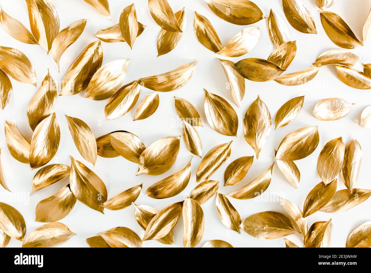Pattern, texture with gold leaves isolated on white background. flat lay, top view Stock Photo ...