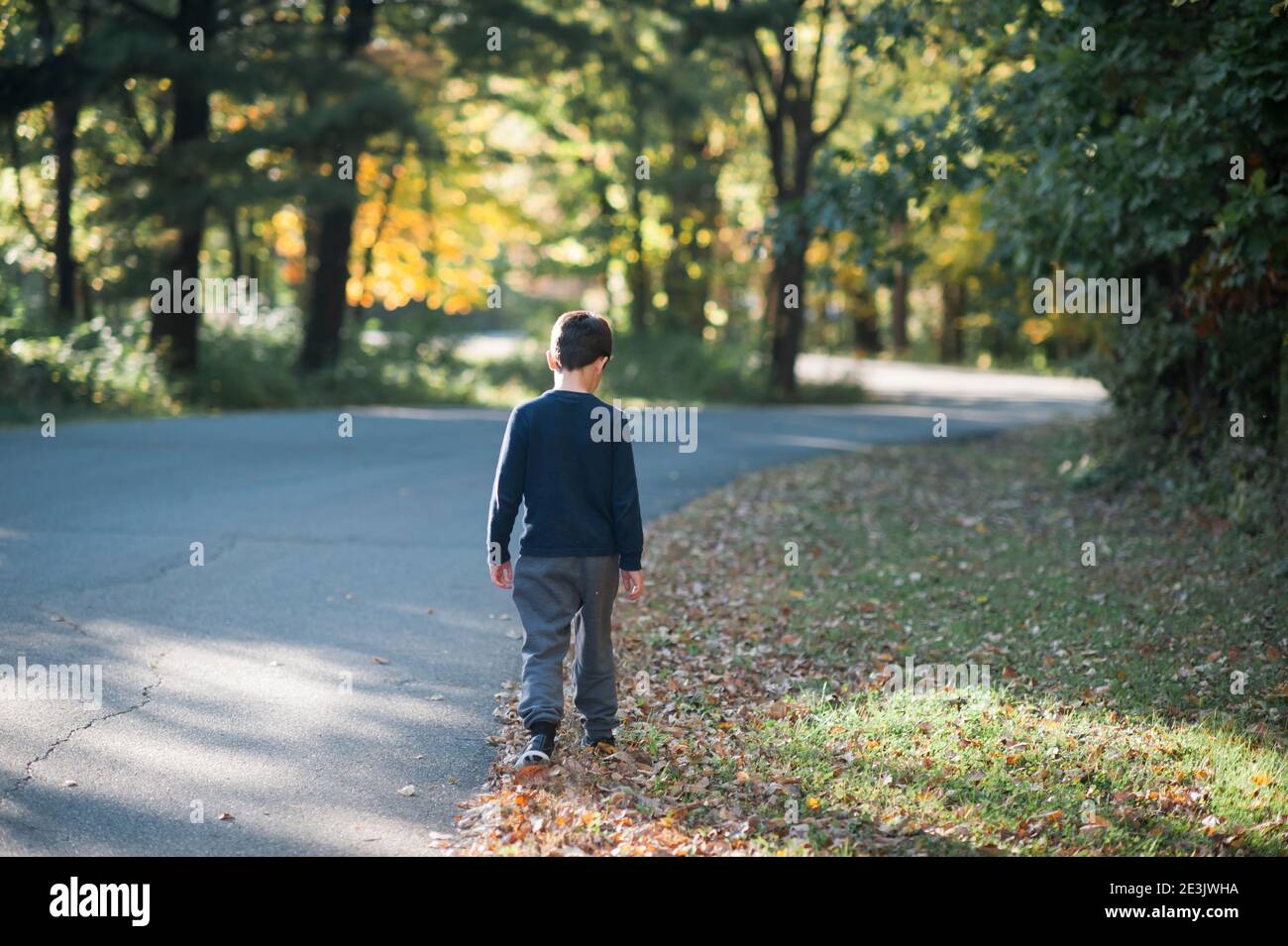 Young Boy Walking Away Cafeteria