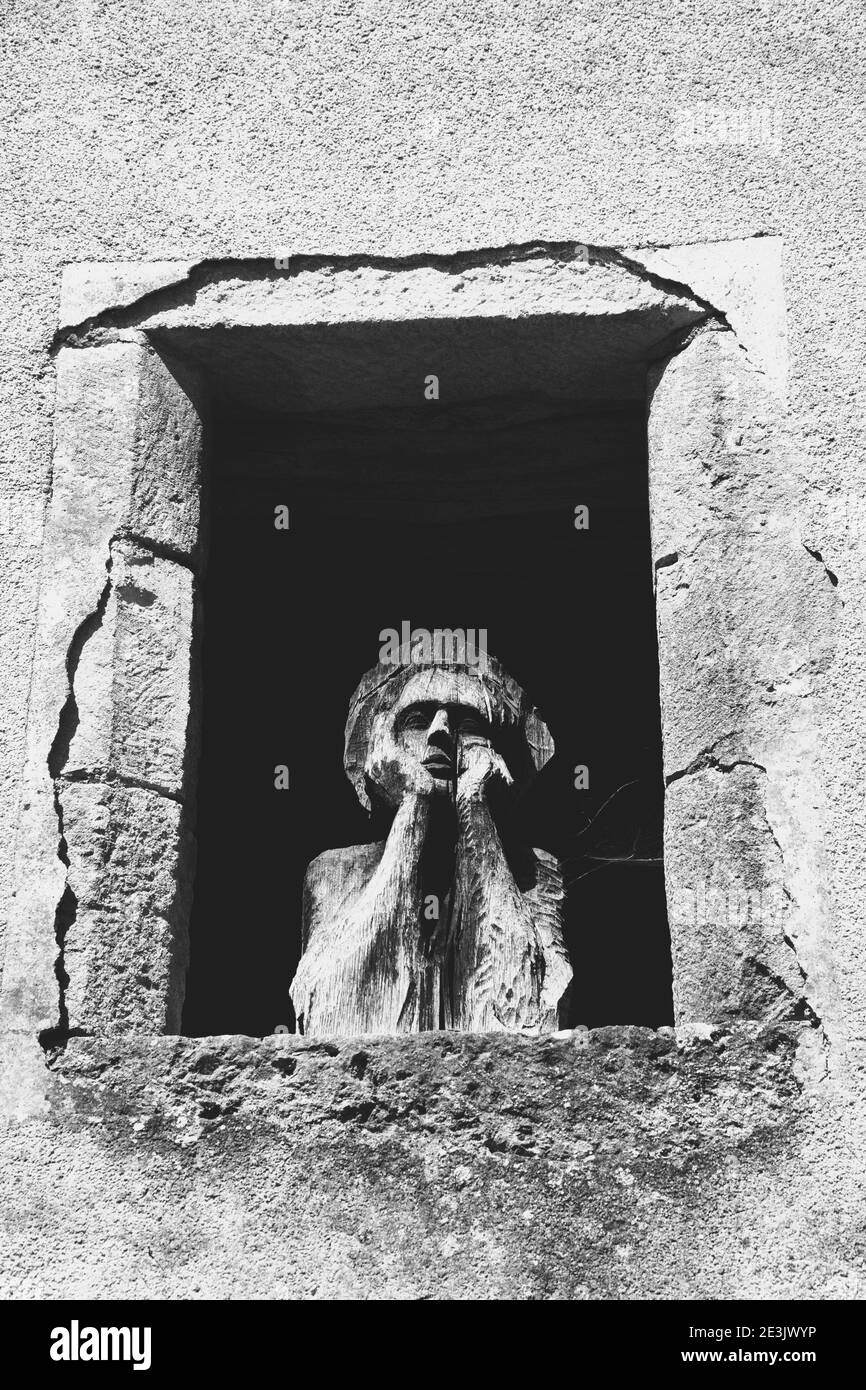 FLAVIGNY-SUR-OZERAIN, FRANCE - AUGUST 26, 2018: Statue of sad human in ...