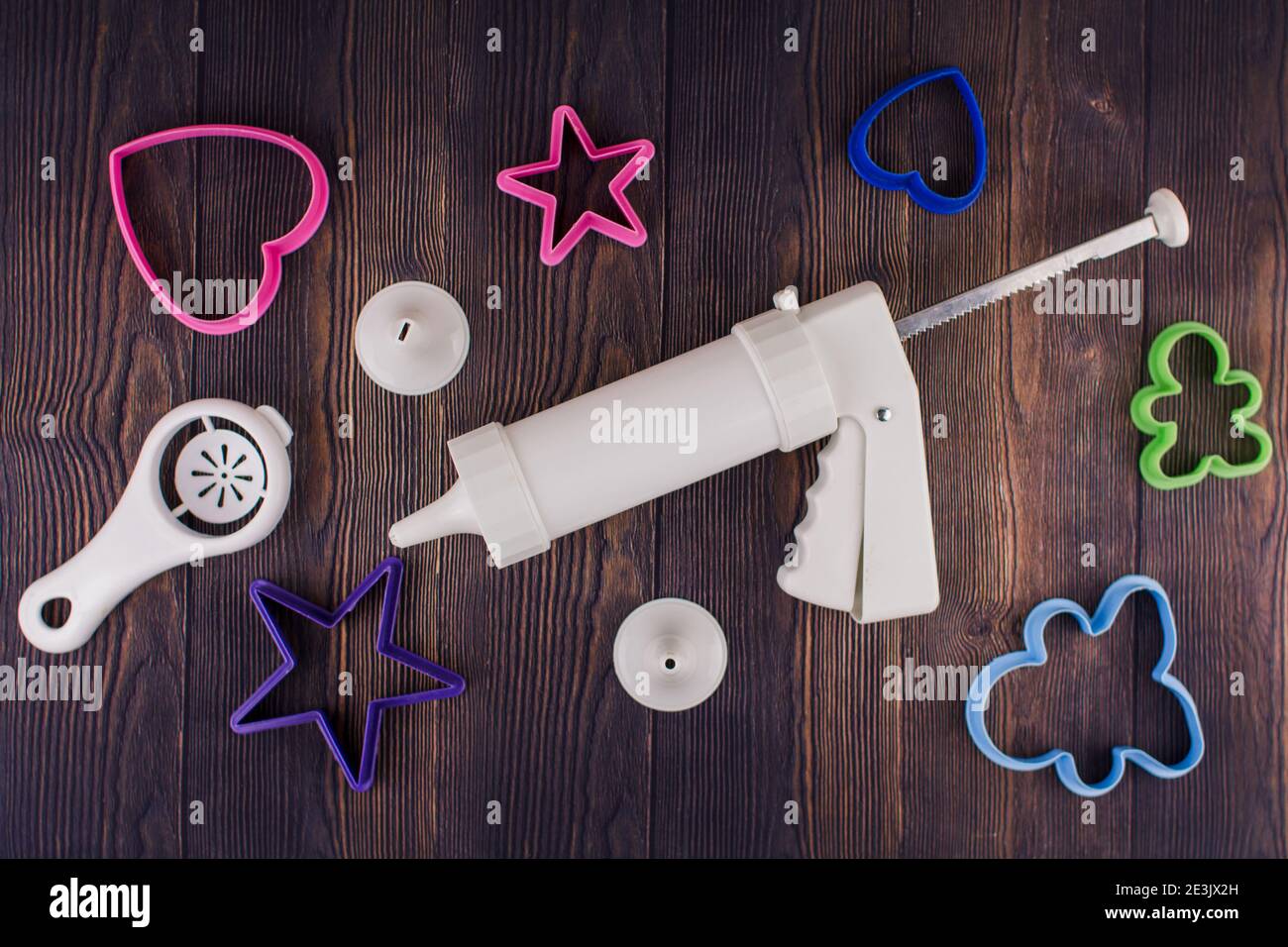 a pastry syringe with molds for cream and cookies Stock Photo - Alamy