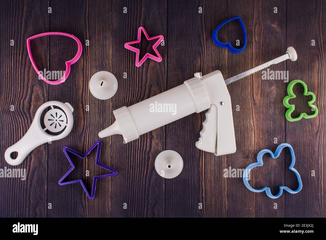 a pastry syringe with molds for cream and cookies Stock Photo - Alamy