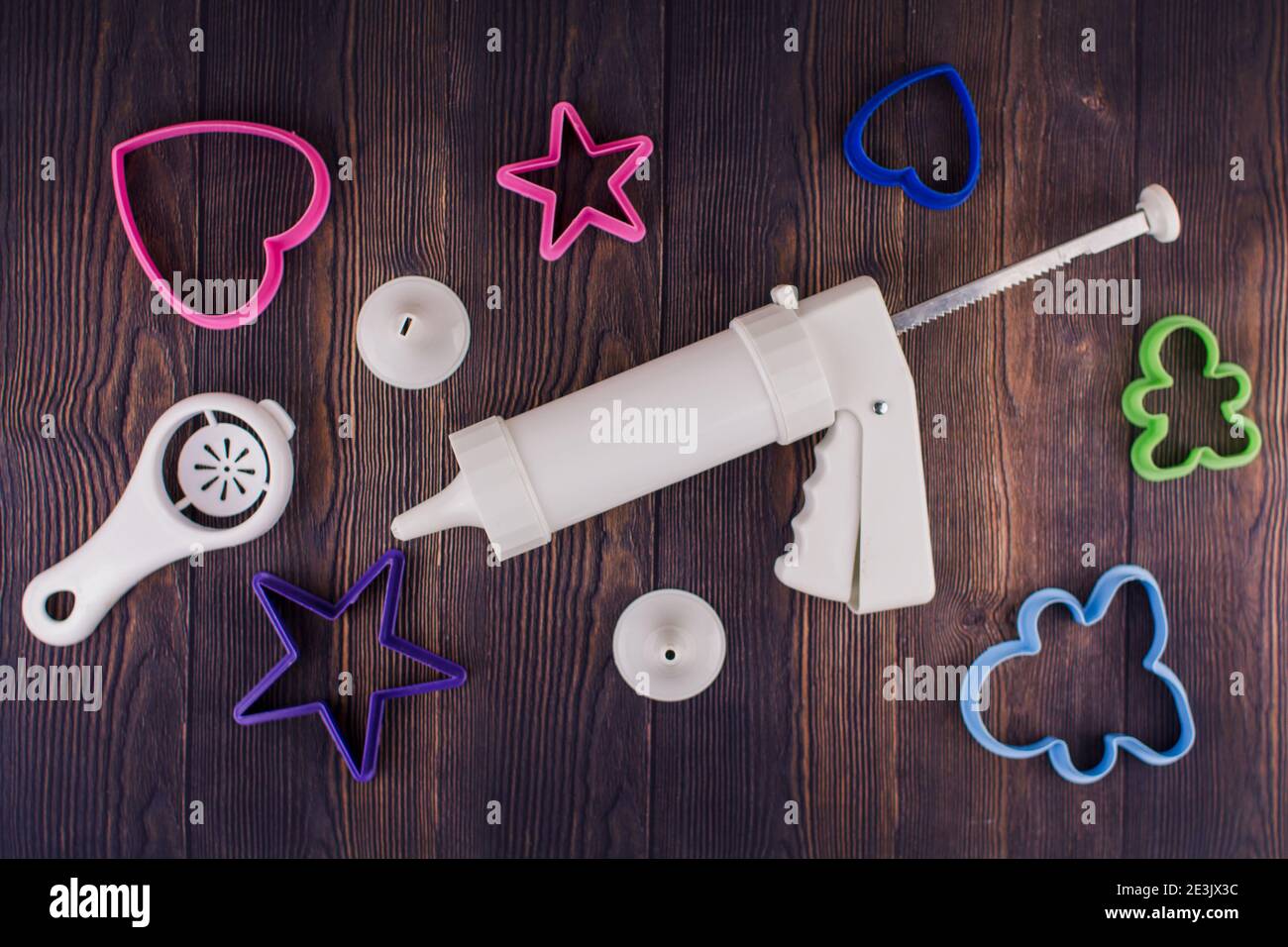 a pastry syringe with molds for cream and cookies Stock Photo - Alamy