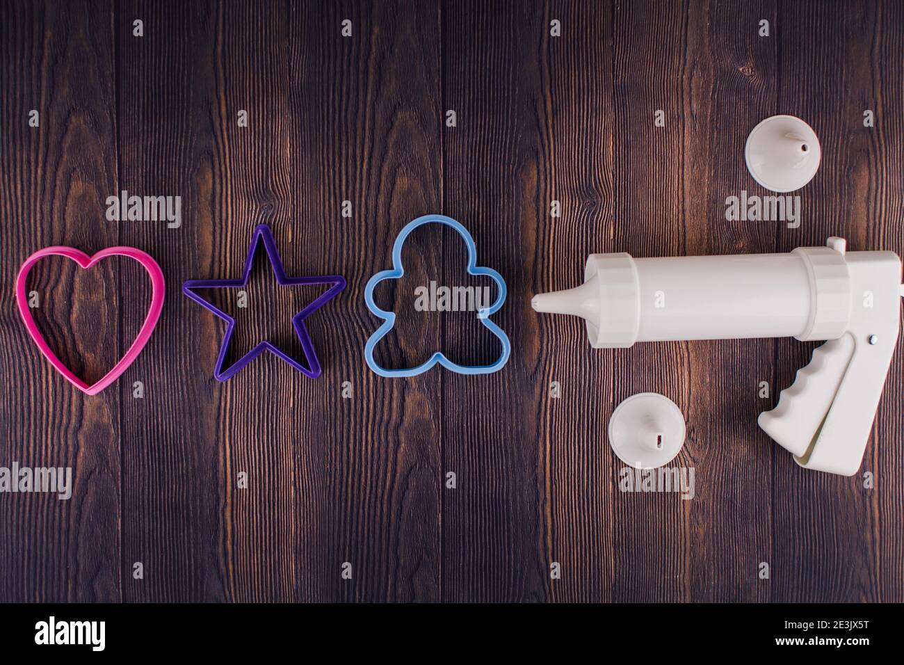 a pastry syringe with molds for cream and cookies Stock Photo - Alamy