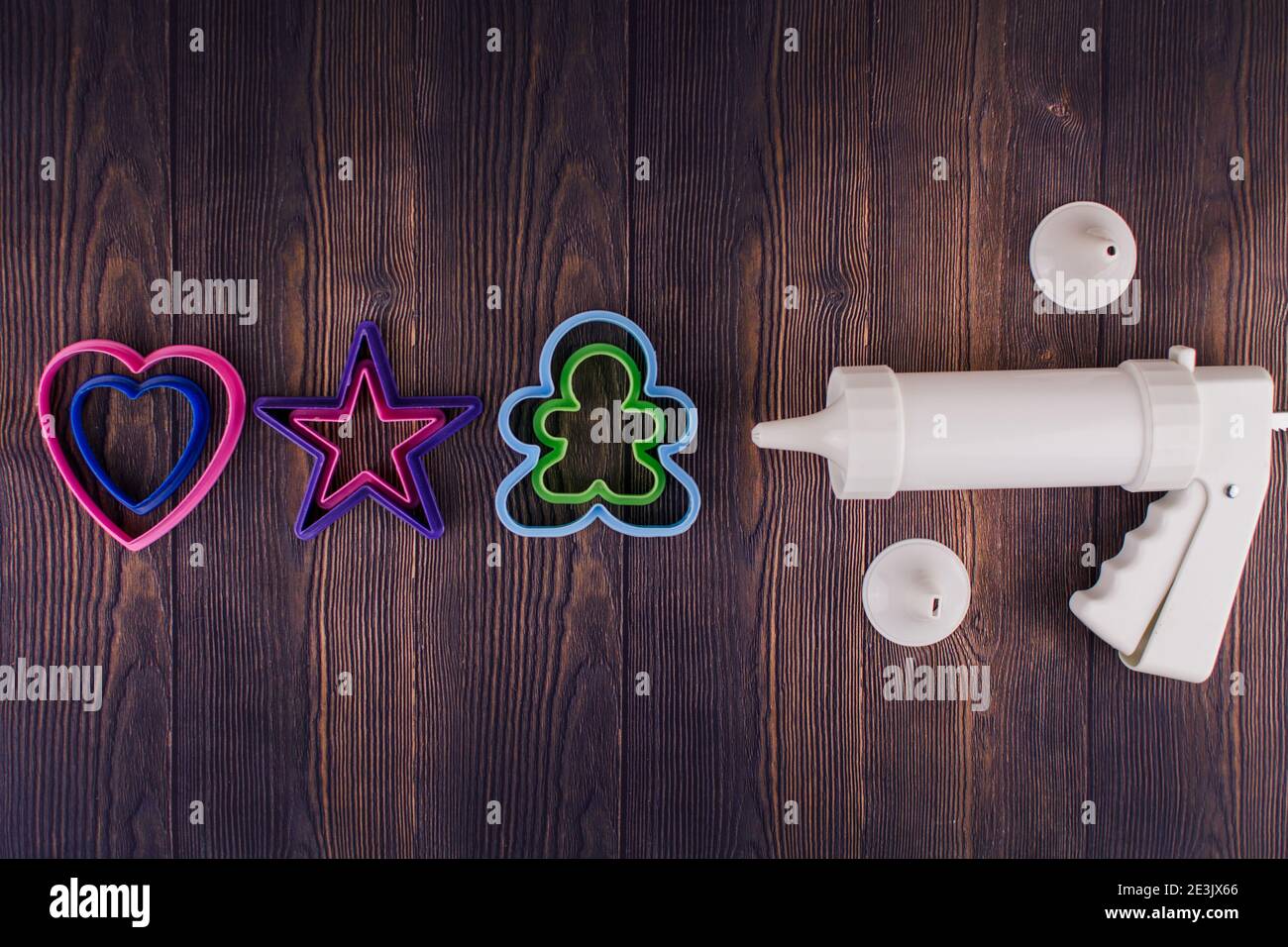 a pastry syringe with molds for cream and cookies Stock Photo - Alamy