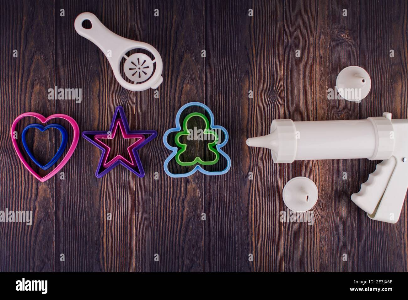 a pastry syringe with molds for cream and cookies Stock Photo - Alamy