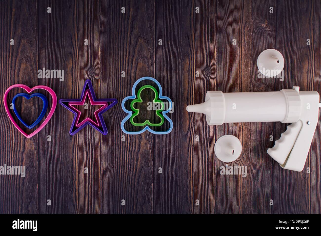 a pastry syringe with molds for cream and cookies Stock Photo - Alamy