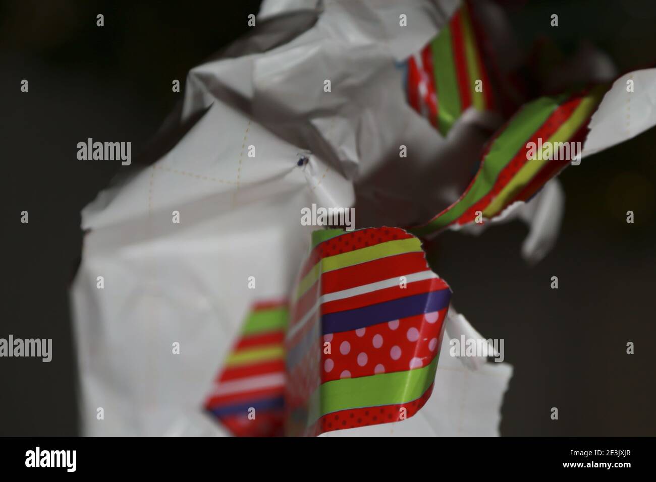 Brightly colored wrapped gift hi-res stock photography and images - Alamy