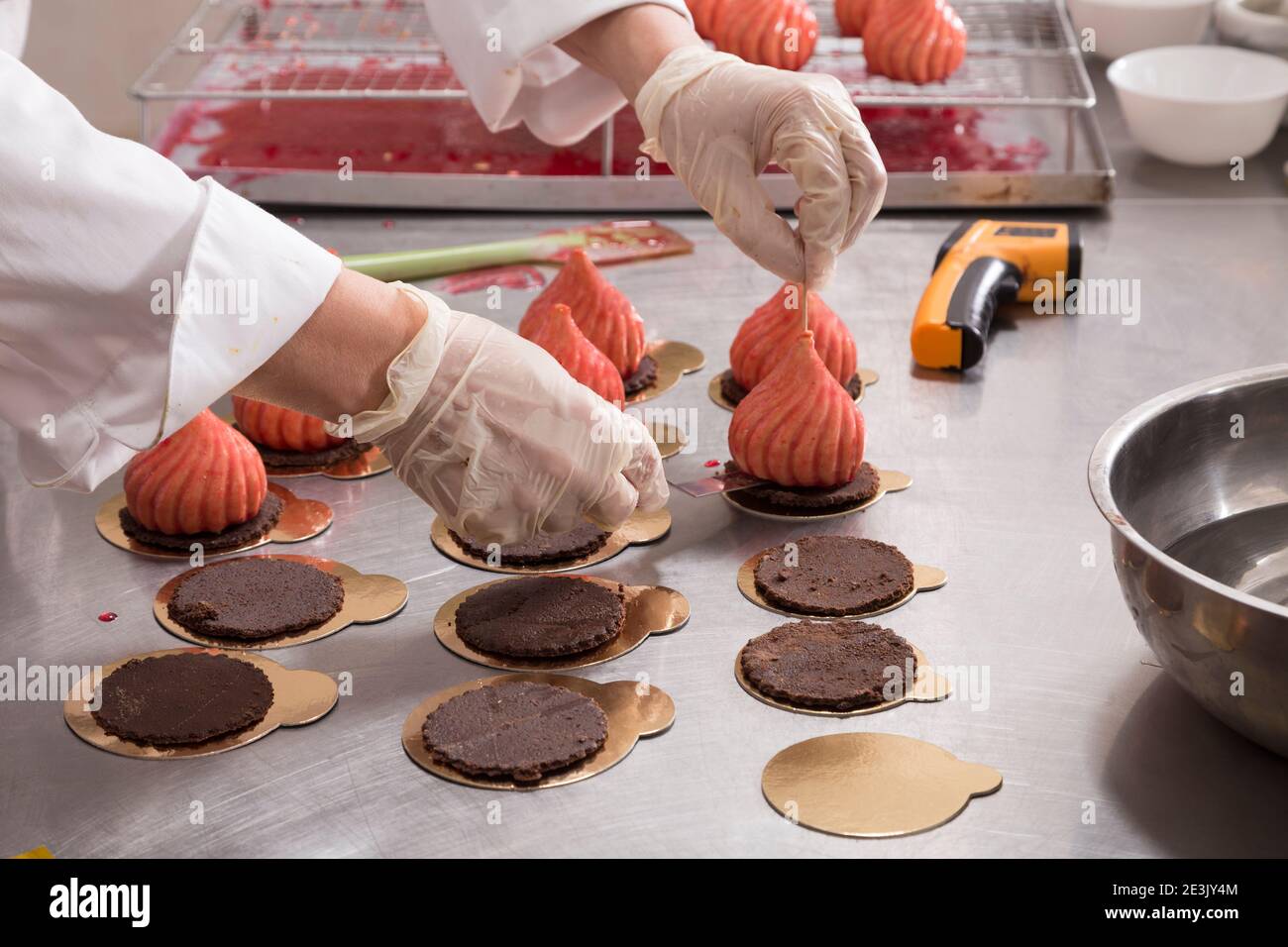 The process of making mousse cake in the shape of a dome. Putting ...