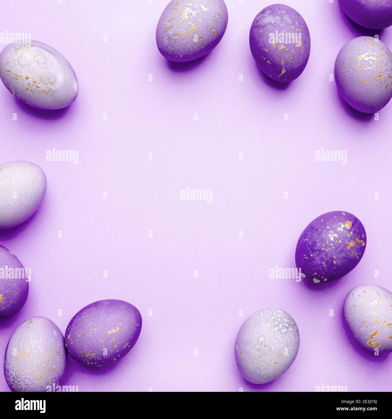Easter frame of eggs painted in purple color Stock Photo - Alamy