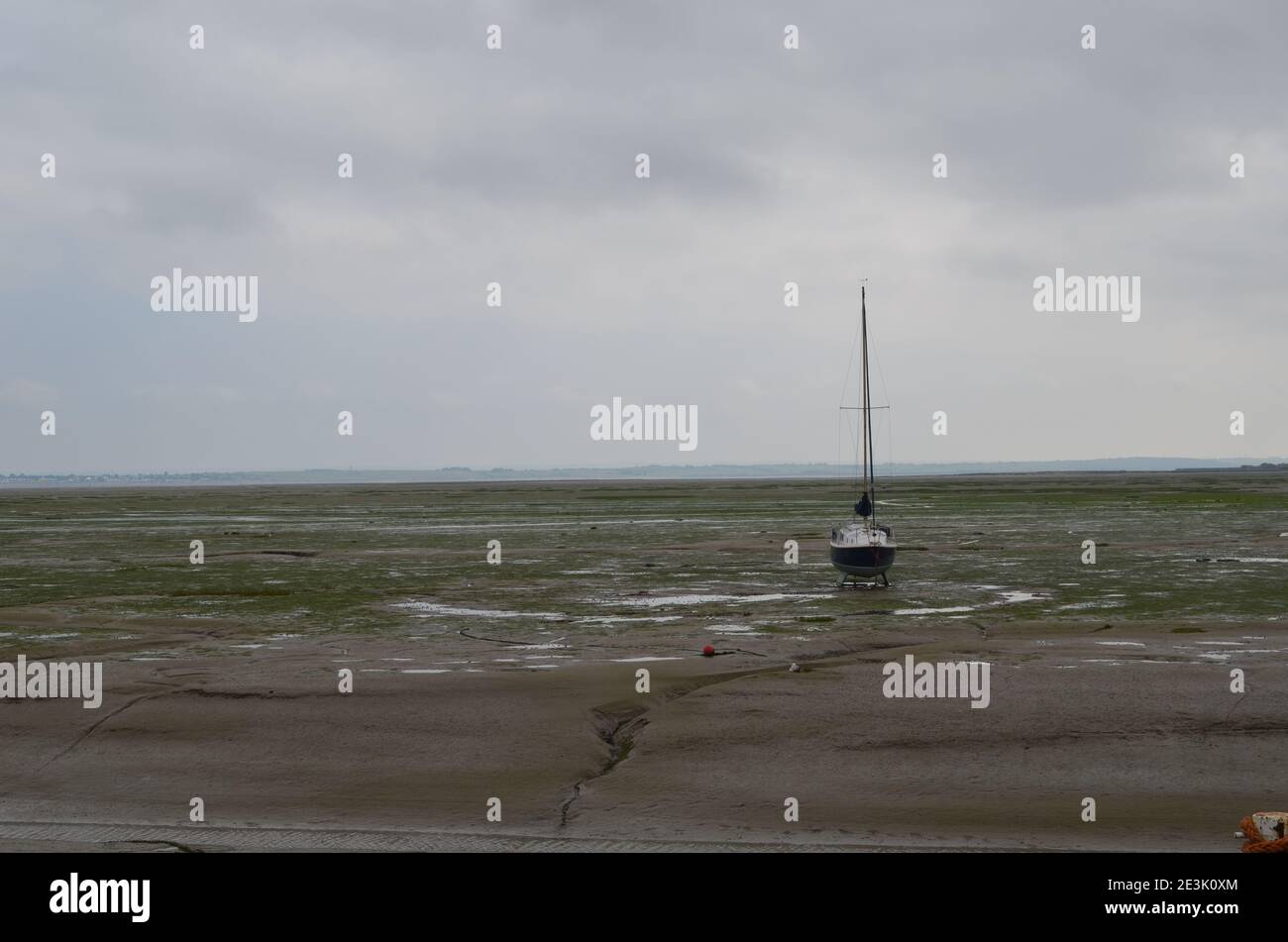 ship on low tide in leigh-on-sea in uk ocean Stock Photo - Alamy