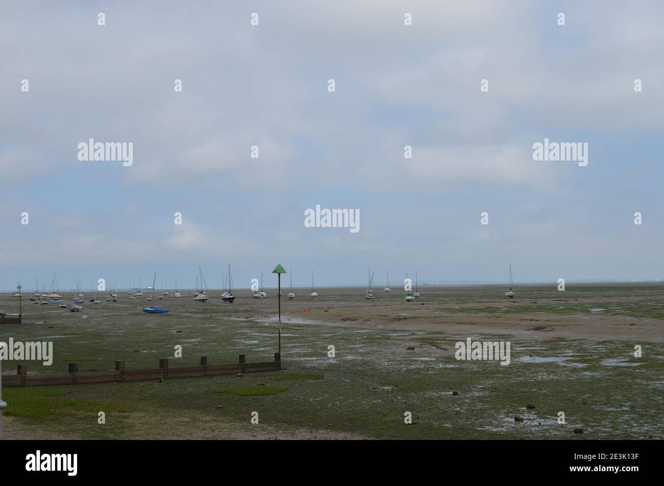 ship on low tide in leigh-on-sea in uk ocean Stock Photo - Alamy