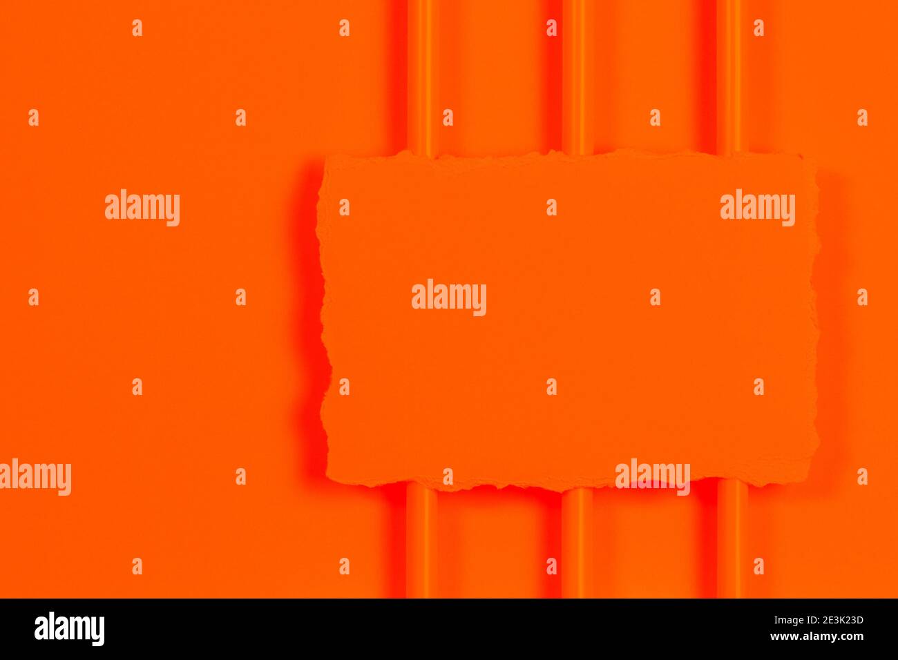 Blank ripped piece of paper, torn paper card on orange color geometric ...