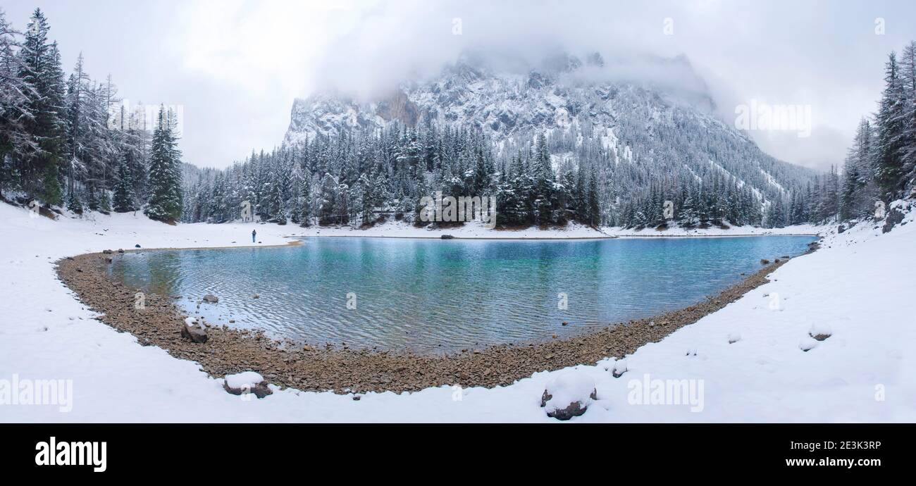 Amazing winter landscape with snowy mountains and clear waters of Green ...