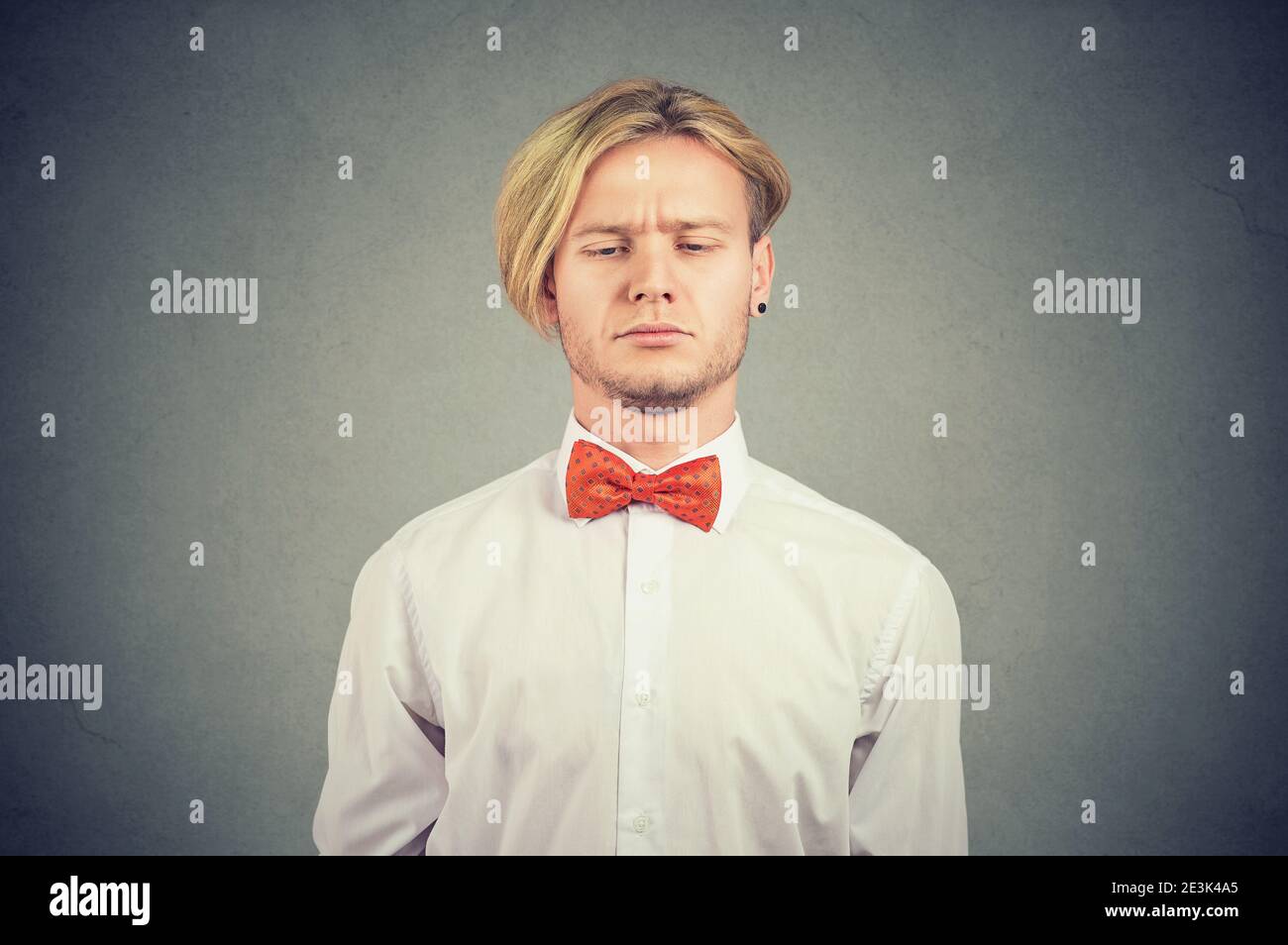 Portrait of a sad young man Stock Photo - Alamy