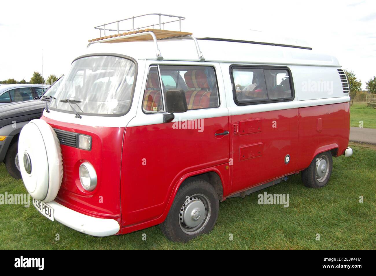 classic VW Camper Van with roof rack red sleeper Stock Photo - Alamy
