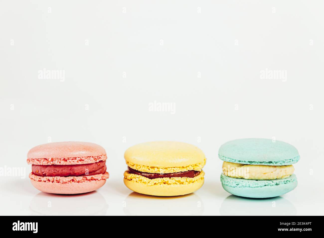 Sweet almond colorful pastel pink blue yellow macaron or macaroon ...