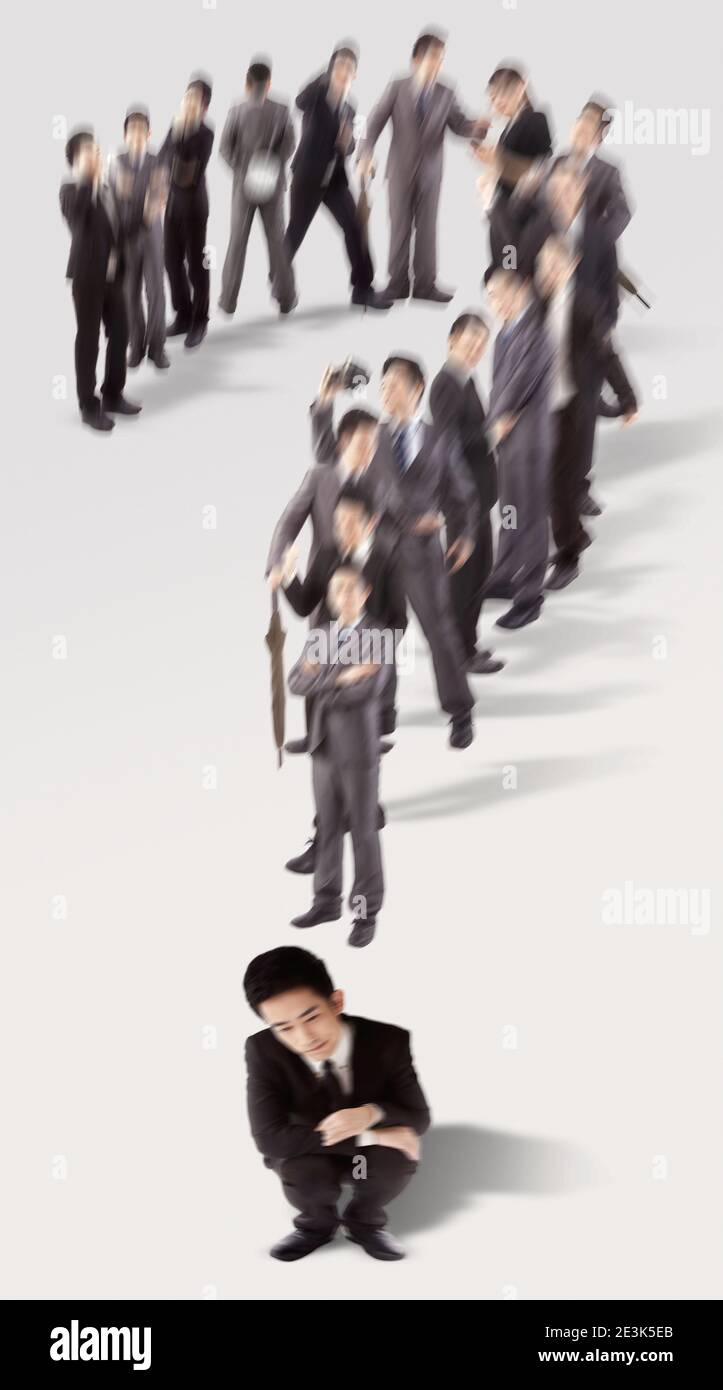 A group of business people formed a question mark high quality photo ...
