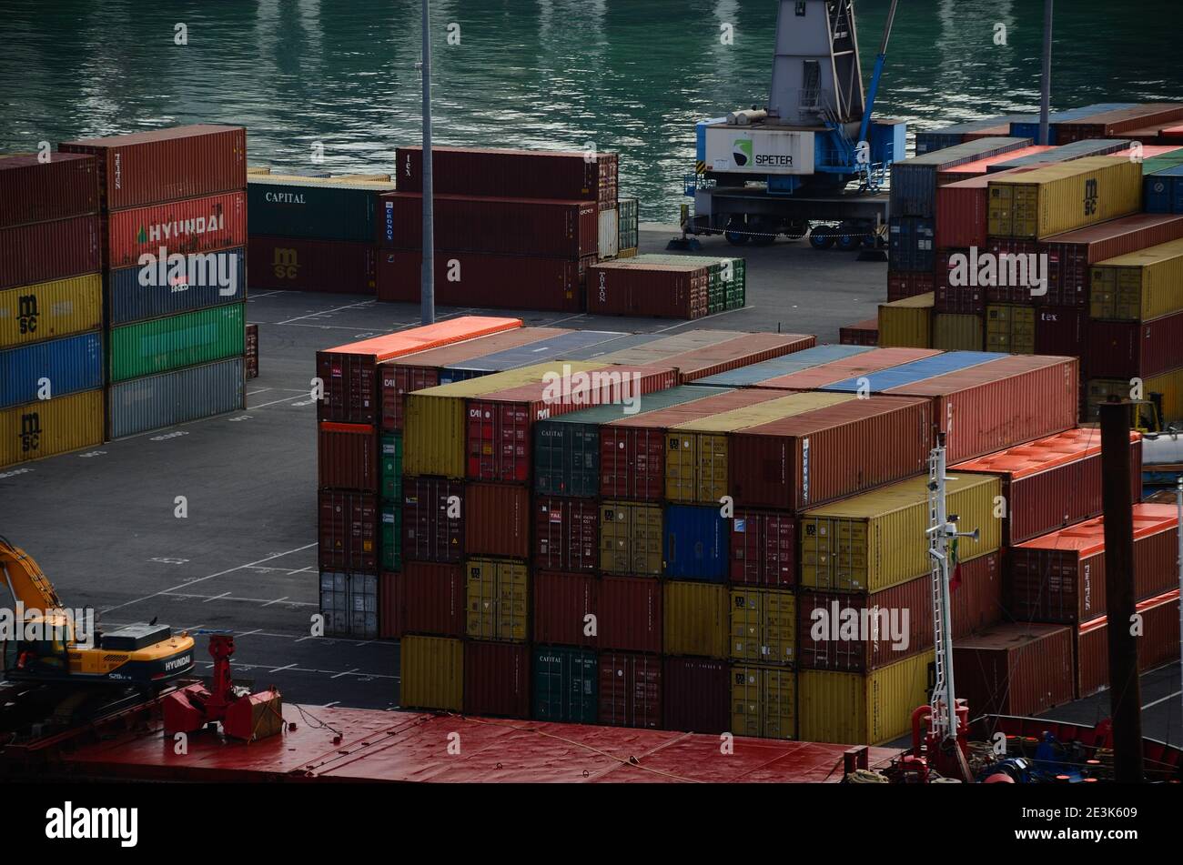 many colorful stacked containers at the port of Naples Stock Photo - Alamy