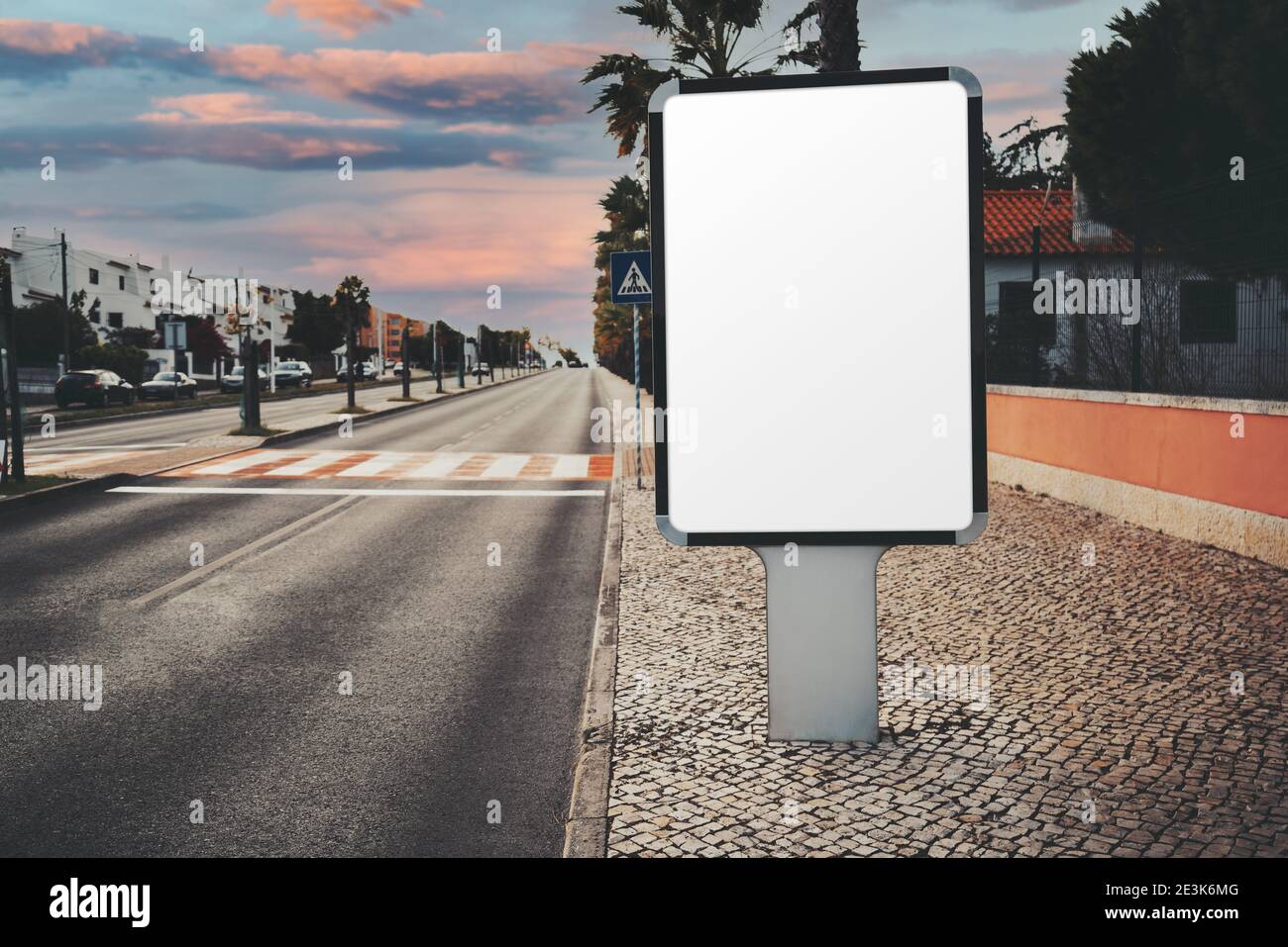 A template of an empty vertical advert banner on the paving-stone; the ...
