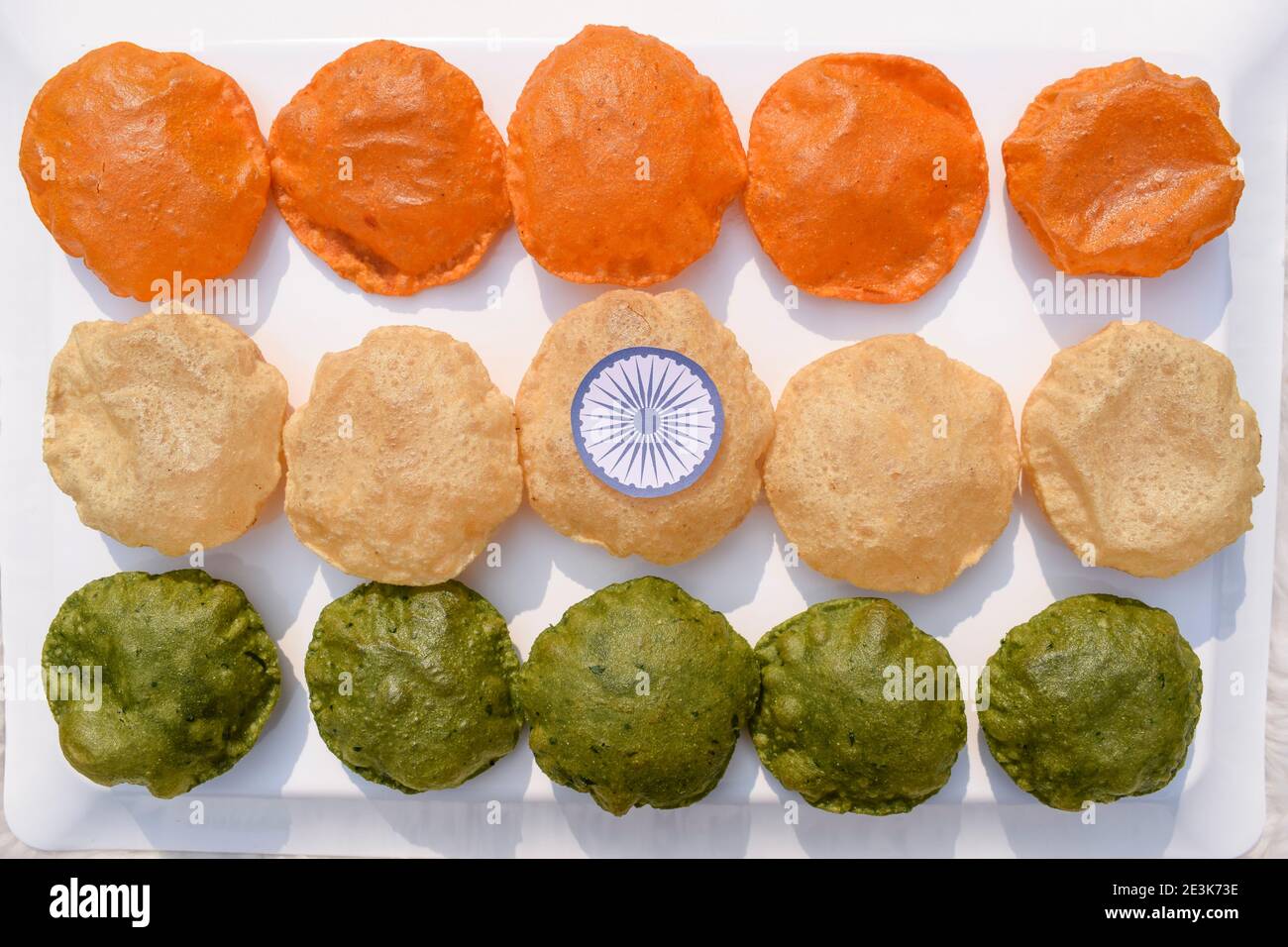 India tricolor / tricolour food breakfast of spinach puri, carrot puri ...
