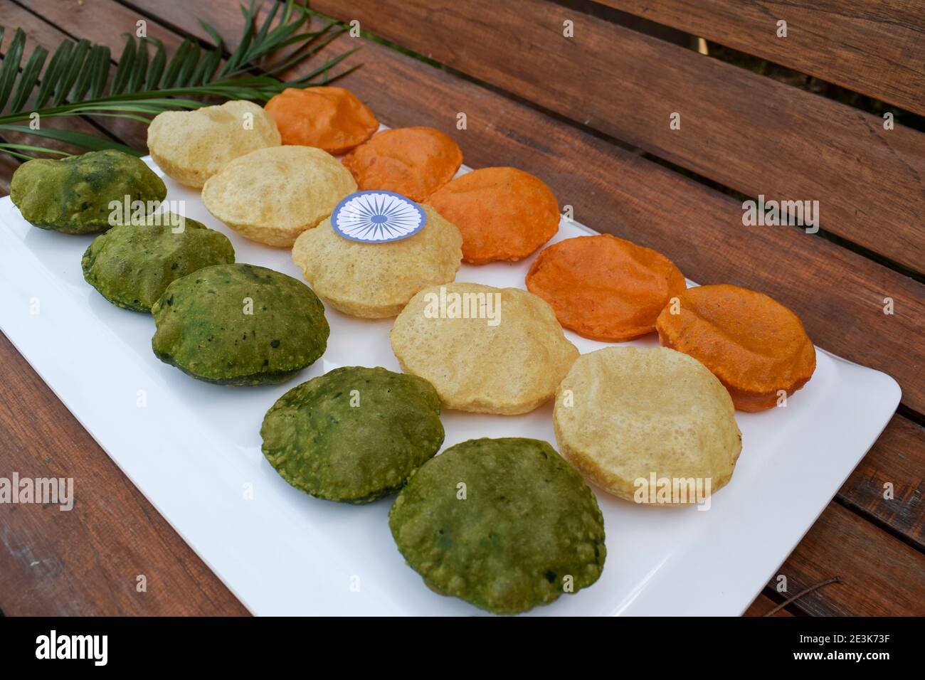 India tricolor / tricolour food breakfast of spinach puri, carrot puri ...