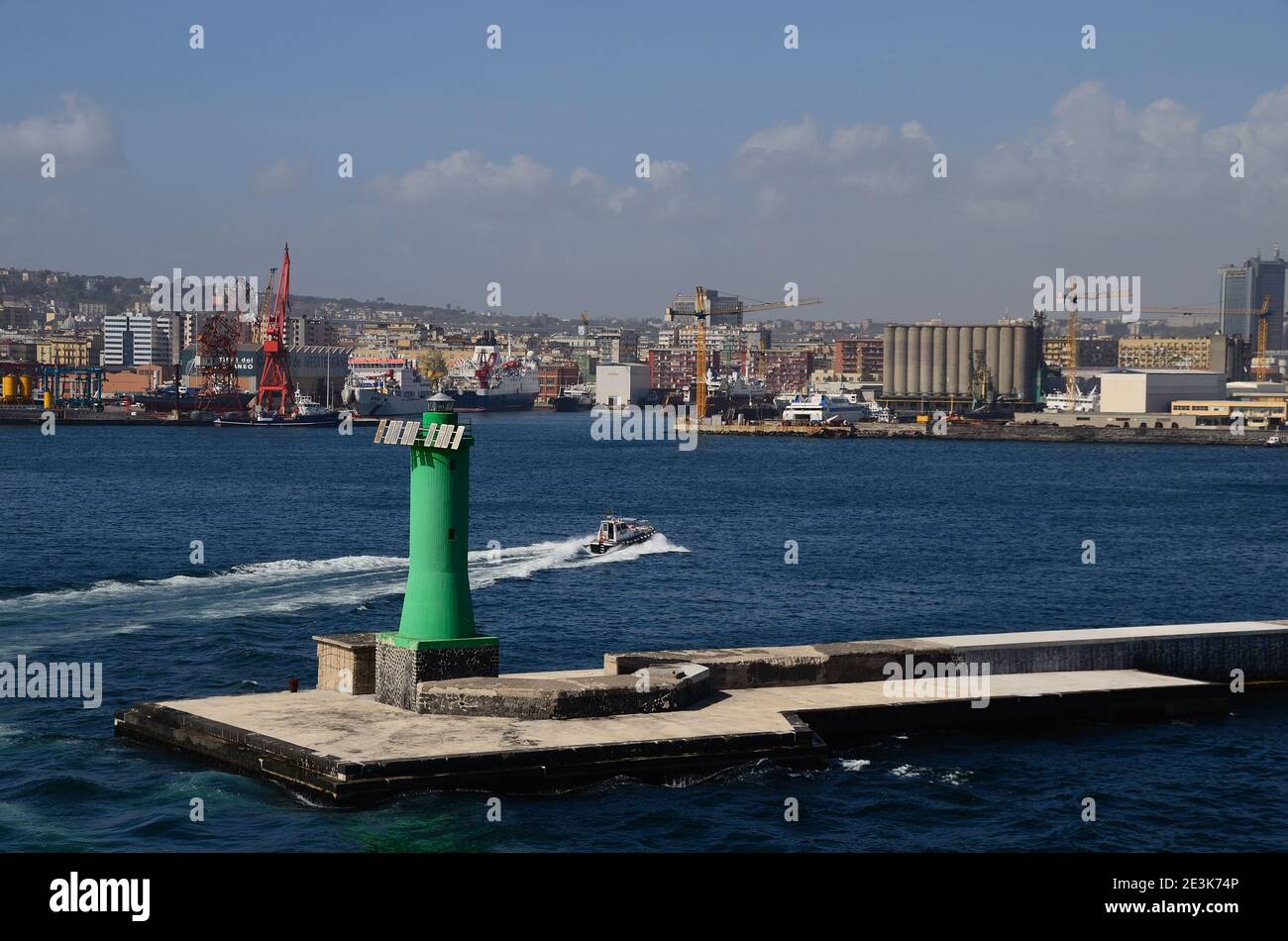 green lighthouse in the port by the sea Stock Photo - Alamy