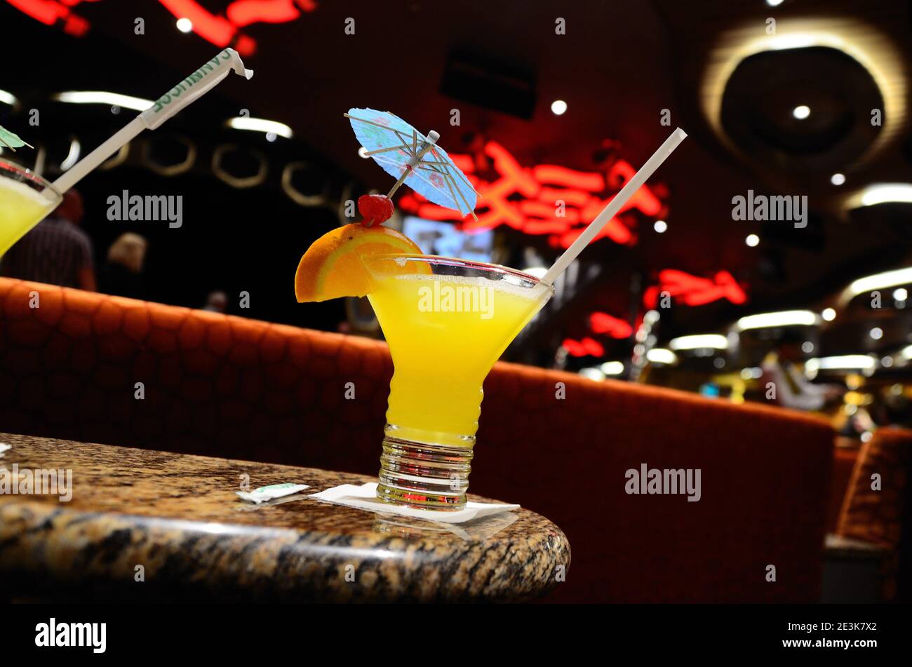 bright yellow cocktail in a bar Stock Photo - Alamy