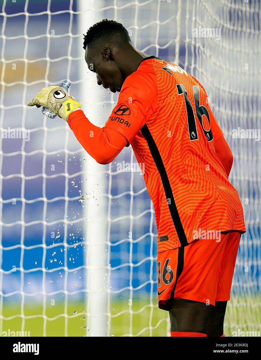 Chelsea goalkeeper Edouard Mendy cools himself down with a bottle of ...