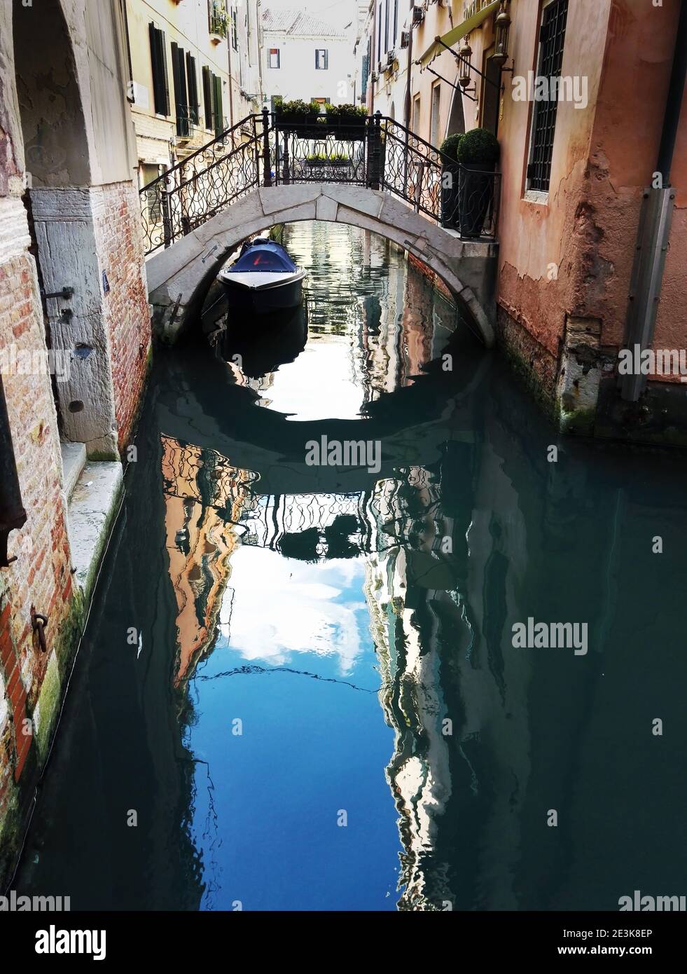 Venice, Italy - September 03, 2018: One of the small bridge on canal ...