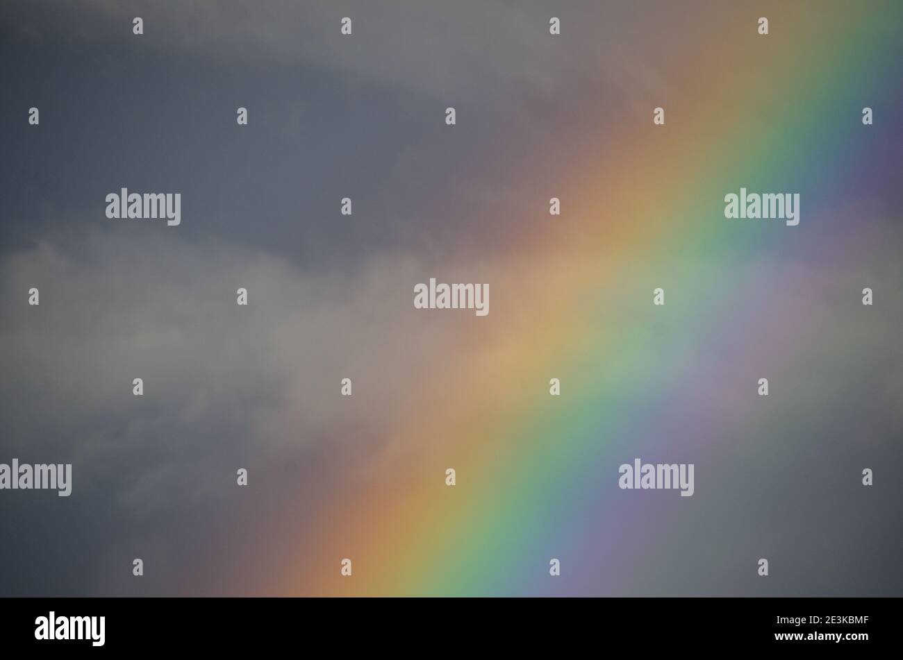 sky and colorful rainbow in summer Stock Photo - Alamy