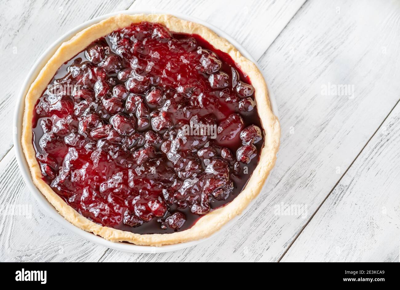 Homemade cherry jam tart on the wooden table Stock Photo - Alamy