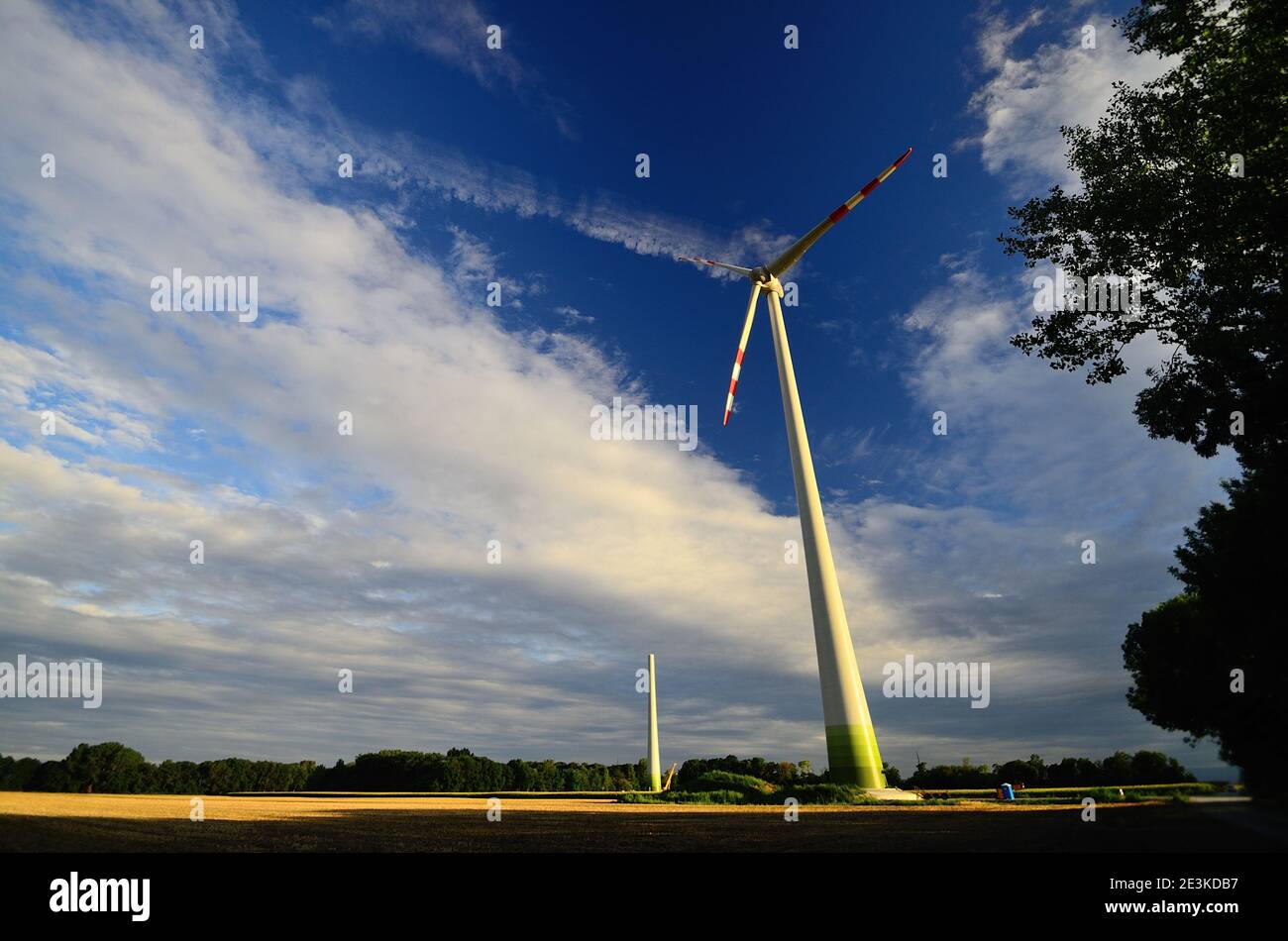 high windmill in nature wide angle view Stock Photo - Alamy