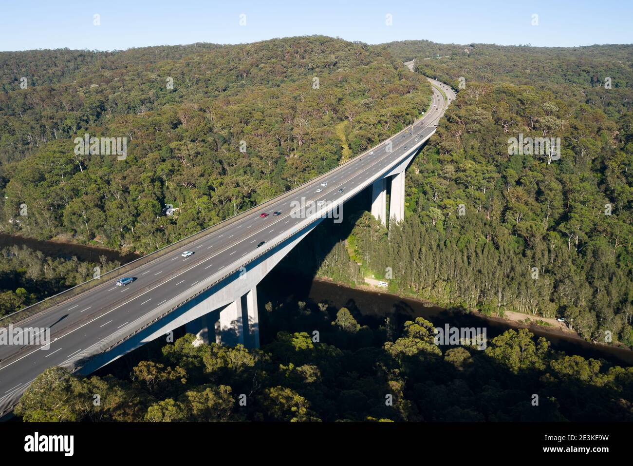 Aerial view of the Pacific Motorway (M1) and the 74m high twin ...