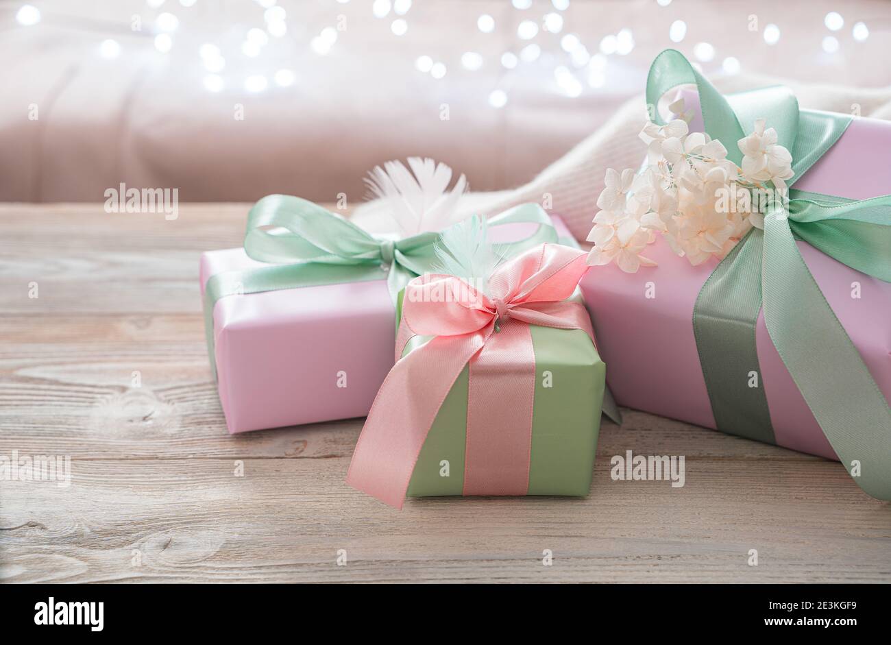 Gift boxes on a festive background. Side view, with space to copy Stock ...