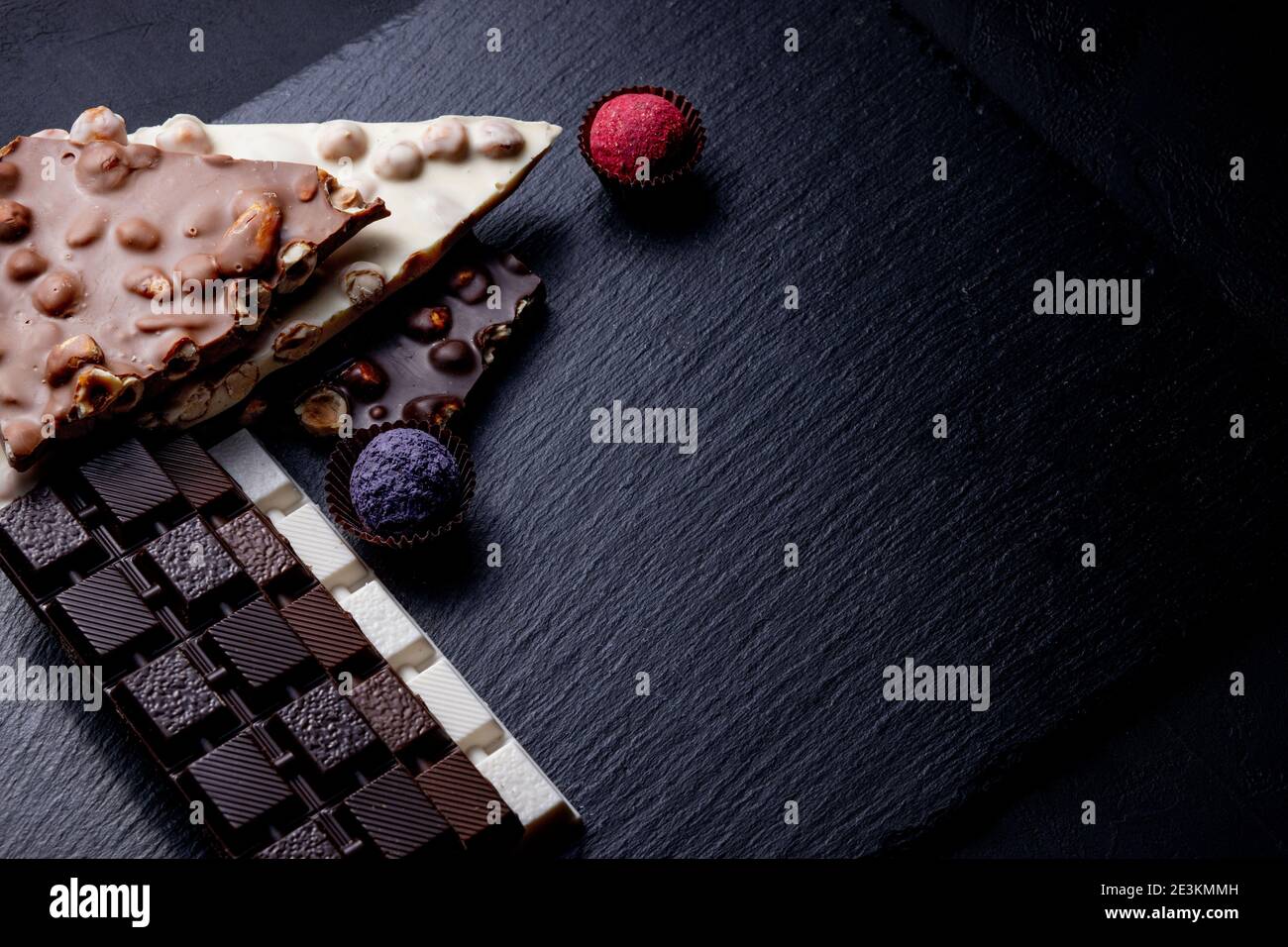 Three types of chocolate - black, milk and white with luxury handmade ...