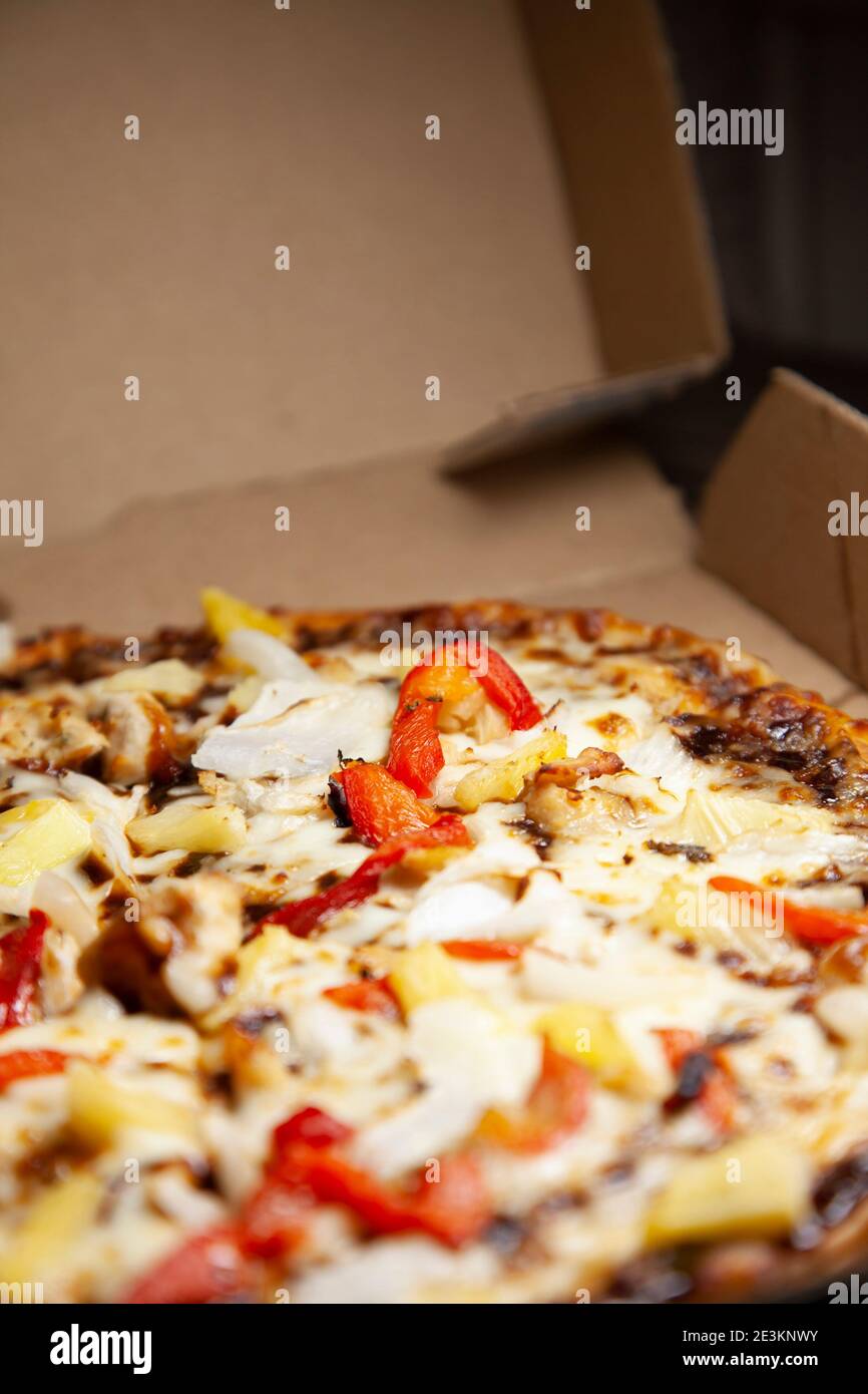 Barbeque chicken, red bell pepper, onion, pineapple pizza in its ...