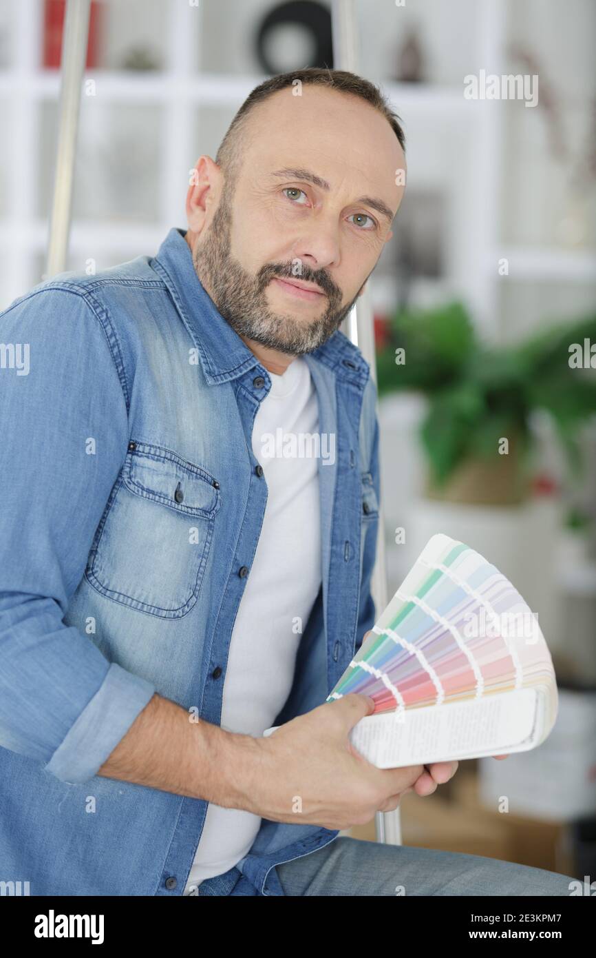 man with color swatch Stock Photo - Alamy