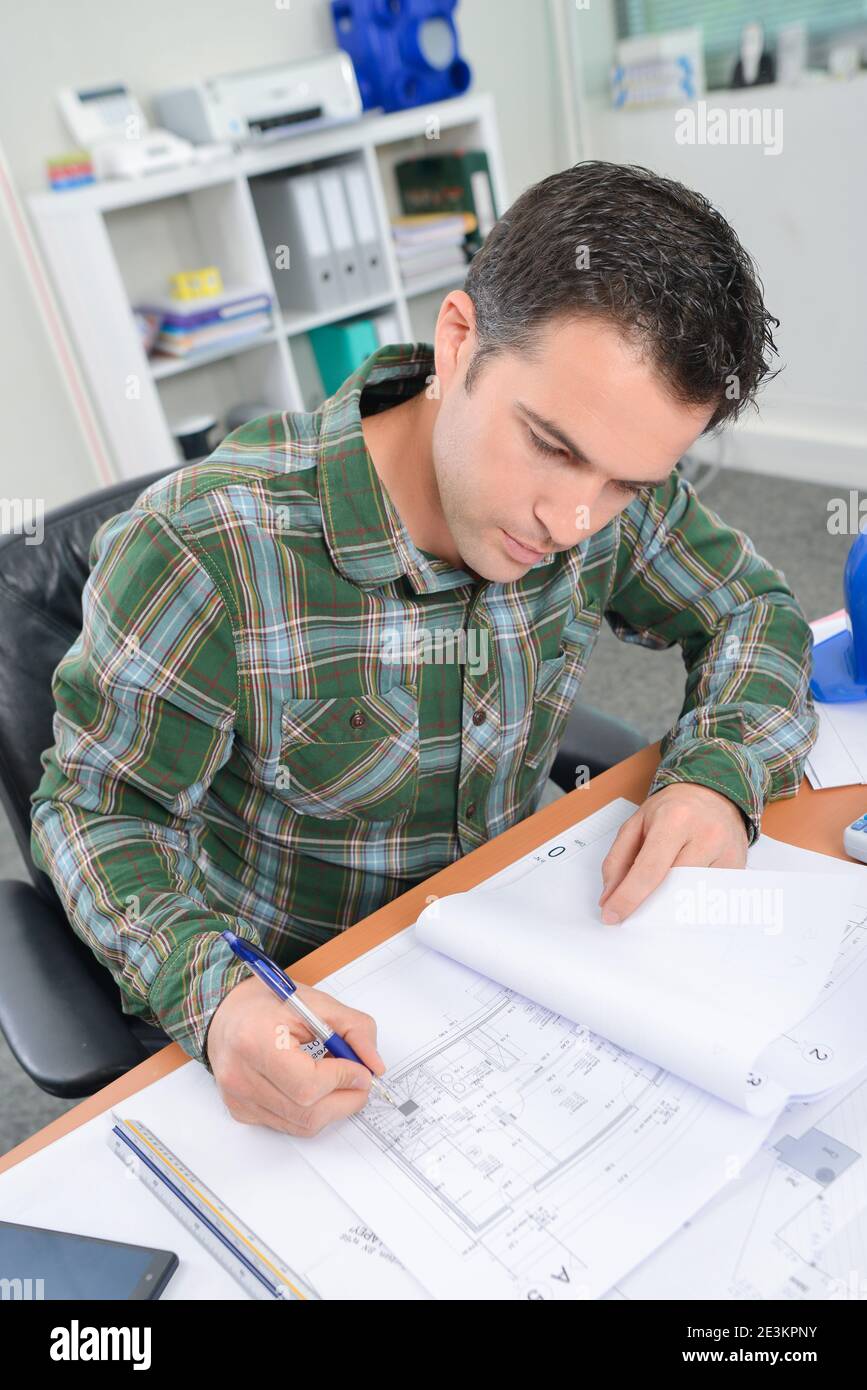 Man working on scale drawings hi-res stock photography and images - Alamy