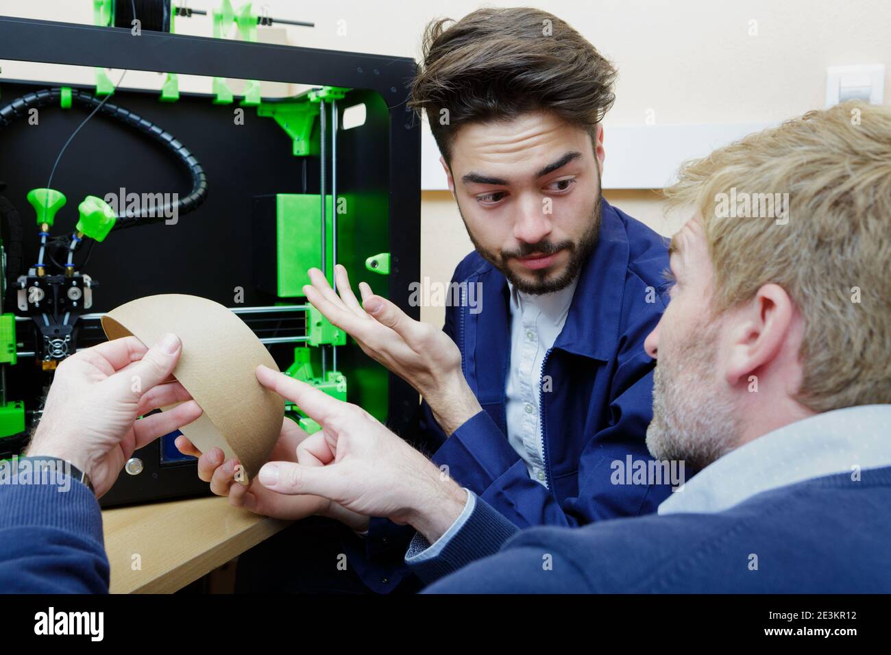 a portrait of engineers talking Stock Photo - Alamy
