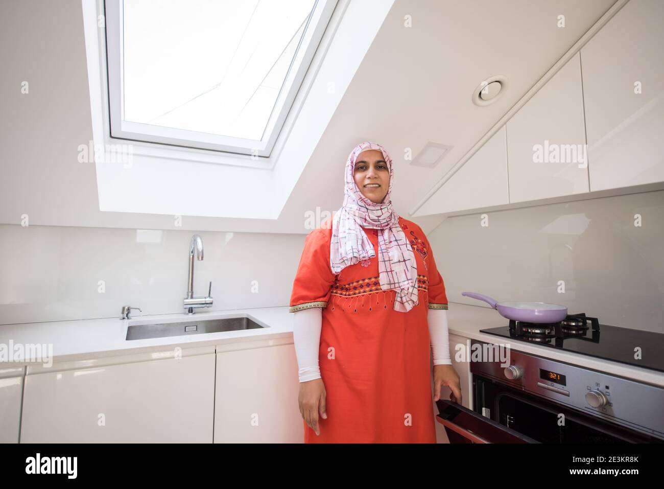 Muslim traditional woman using stove, high quality picture Stock Photo ...