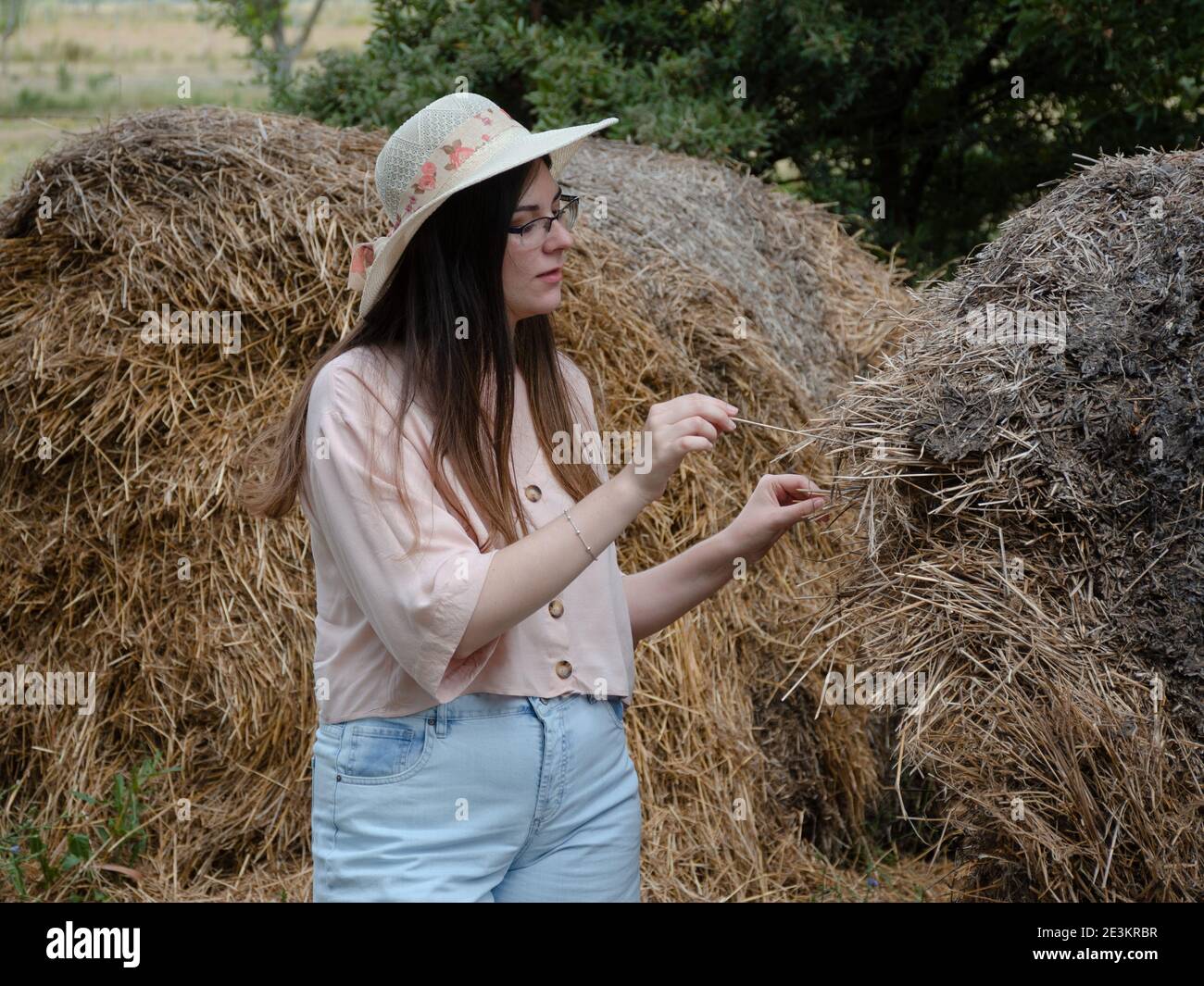 Happy pretty girl playing straw hi-res stock photography and images - Alamy