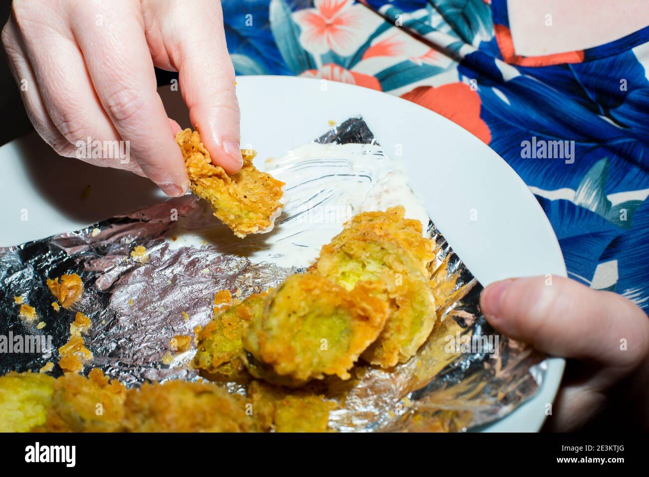 Woman eating a pickle hi-res stock photography and images - Alamy